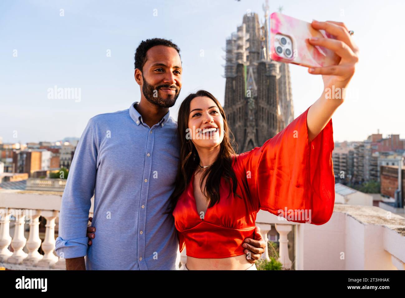 Multiracial beautiful happy couple of lovers dating on rooftop balcony ...