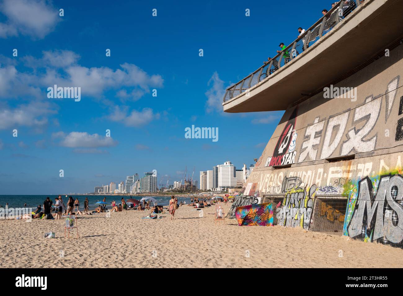 Tel Aviv Israel September 9.2023; Concrete wall with graffiti. People ...