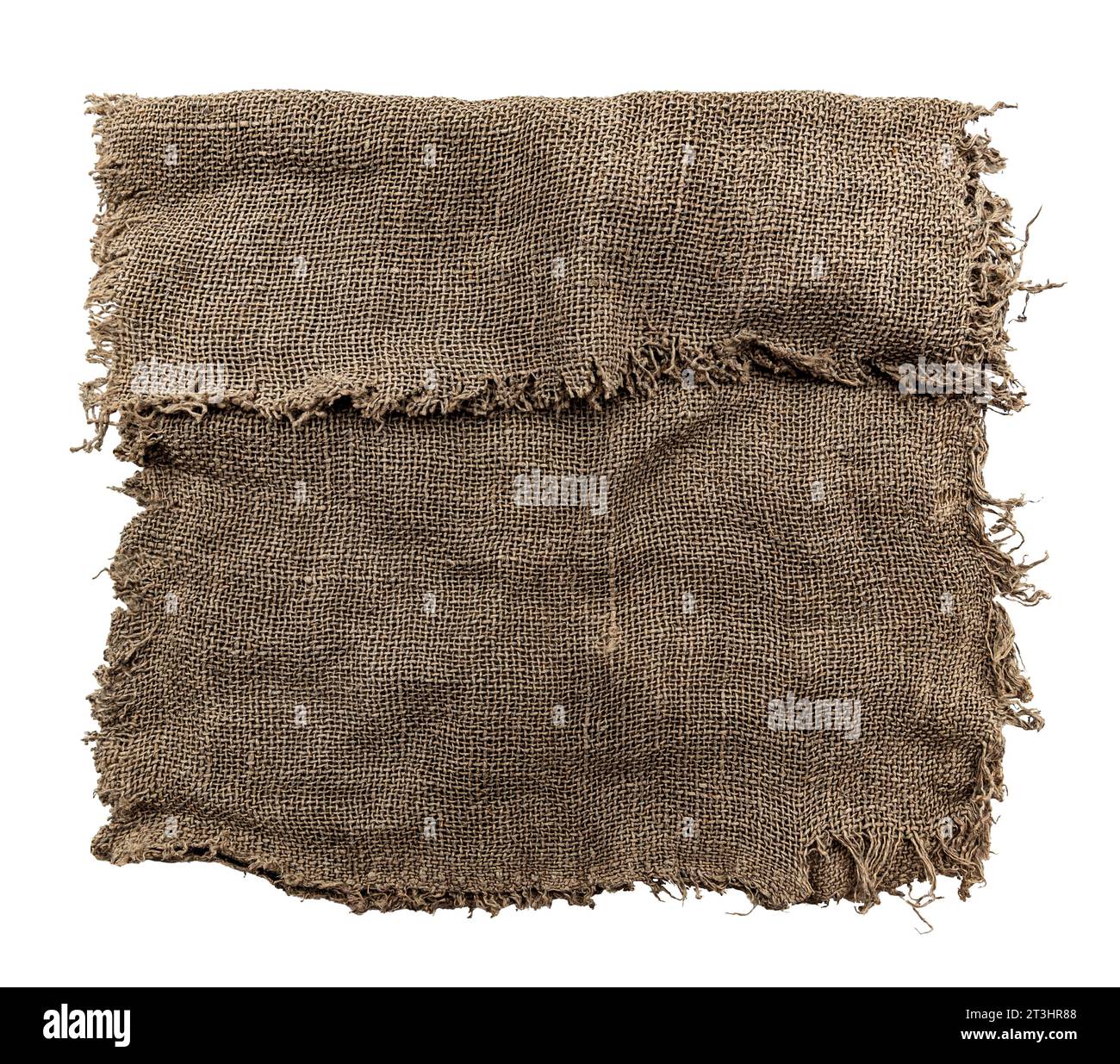 Burlap texture. A piece of torn burlap on a white background. Canvas ...