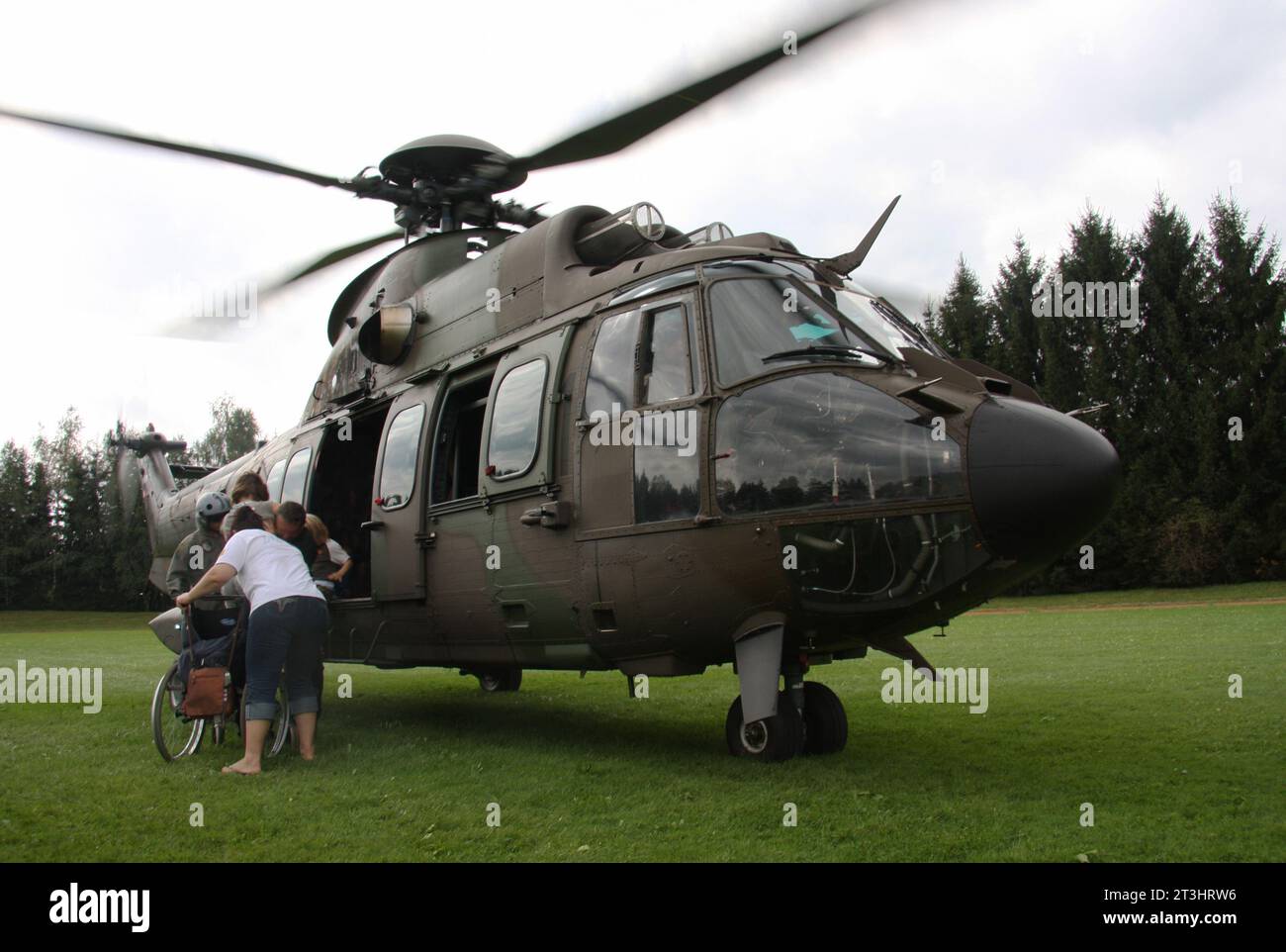 Helicopter in rescue action Stock Photo - Alamy