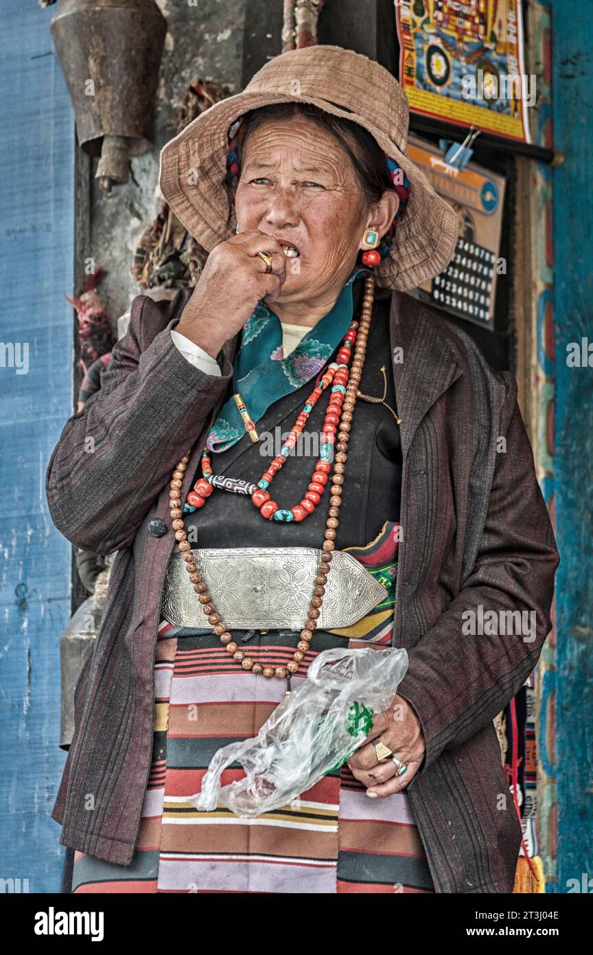 Unidentified Tibetan pilgrim in Sakya Monastery also known as Pel Sakya ...