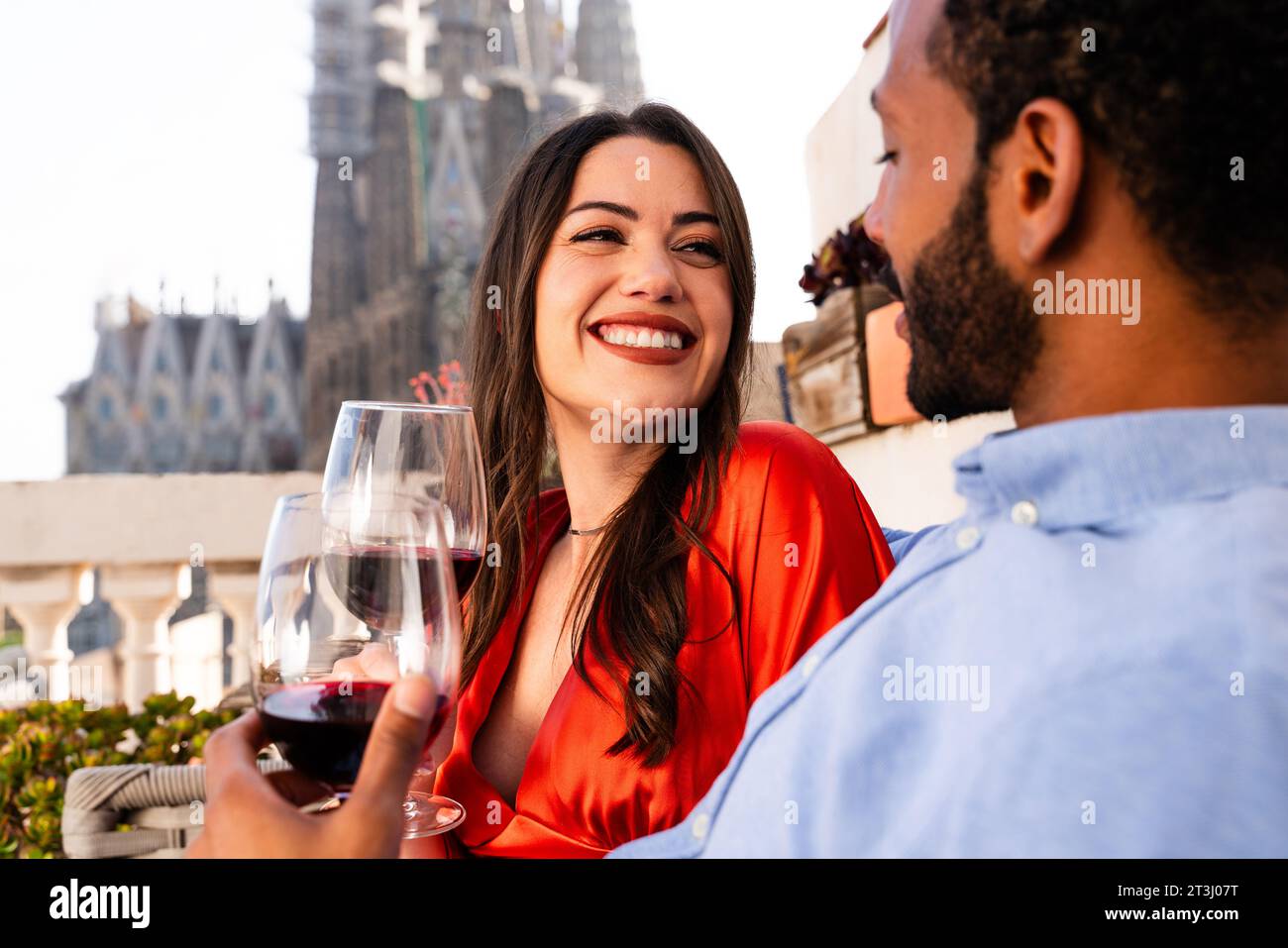 Multiracial beautiful happy couple of lovers dating on rooftop balcony ...