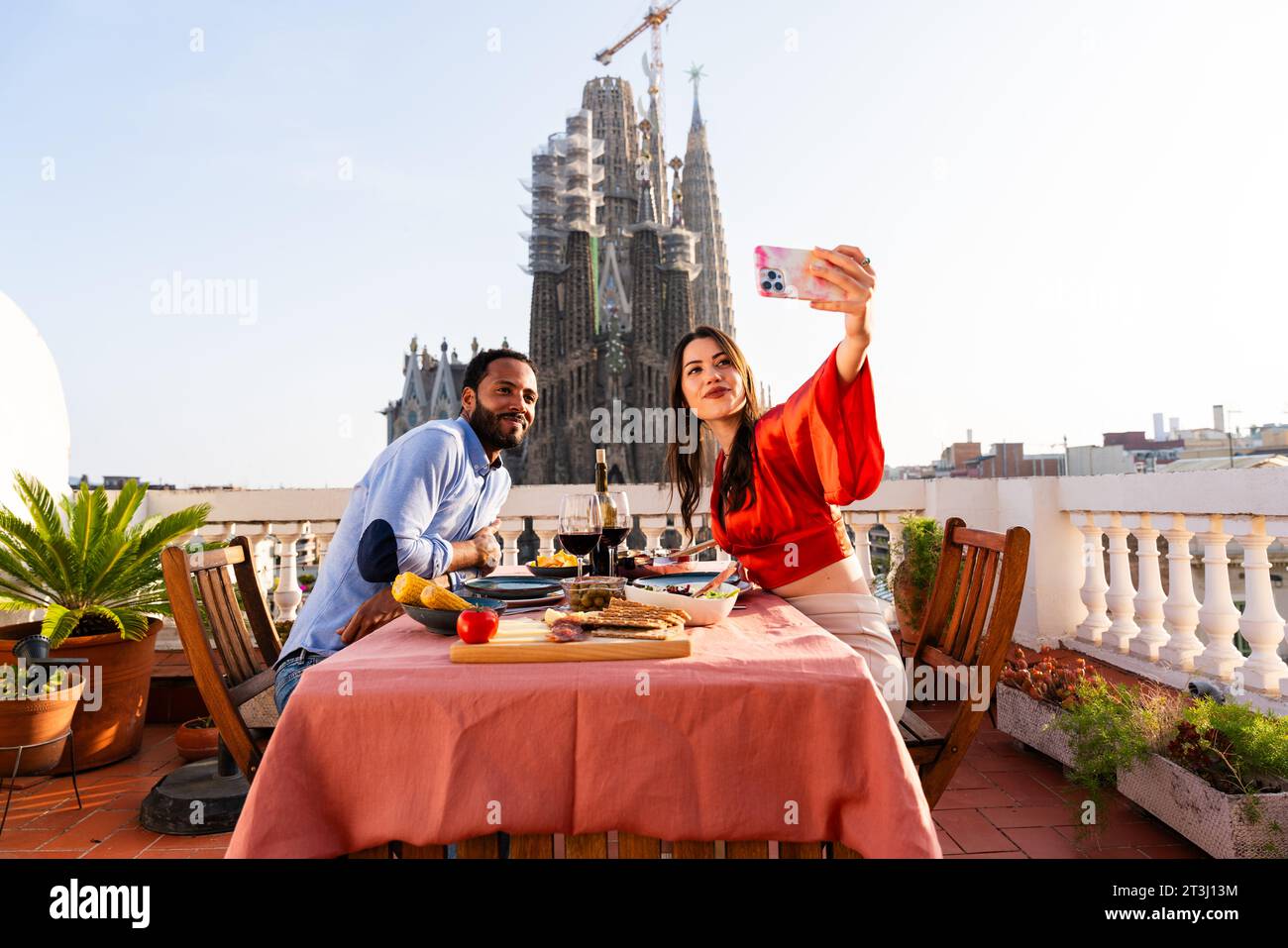 Multiracial beautiful happy couple of lovers dating on rooftop balcony ...