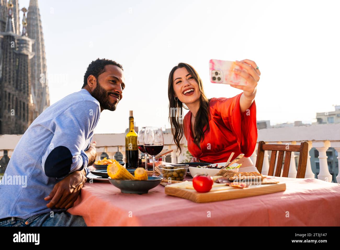 Multiracial beautiful happy couple of lovers dating on rooftop balcony ...