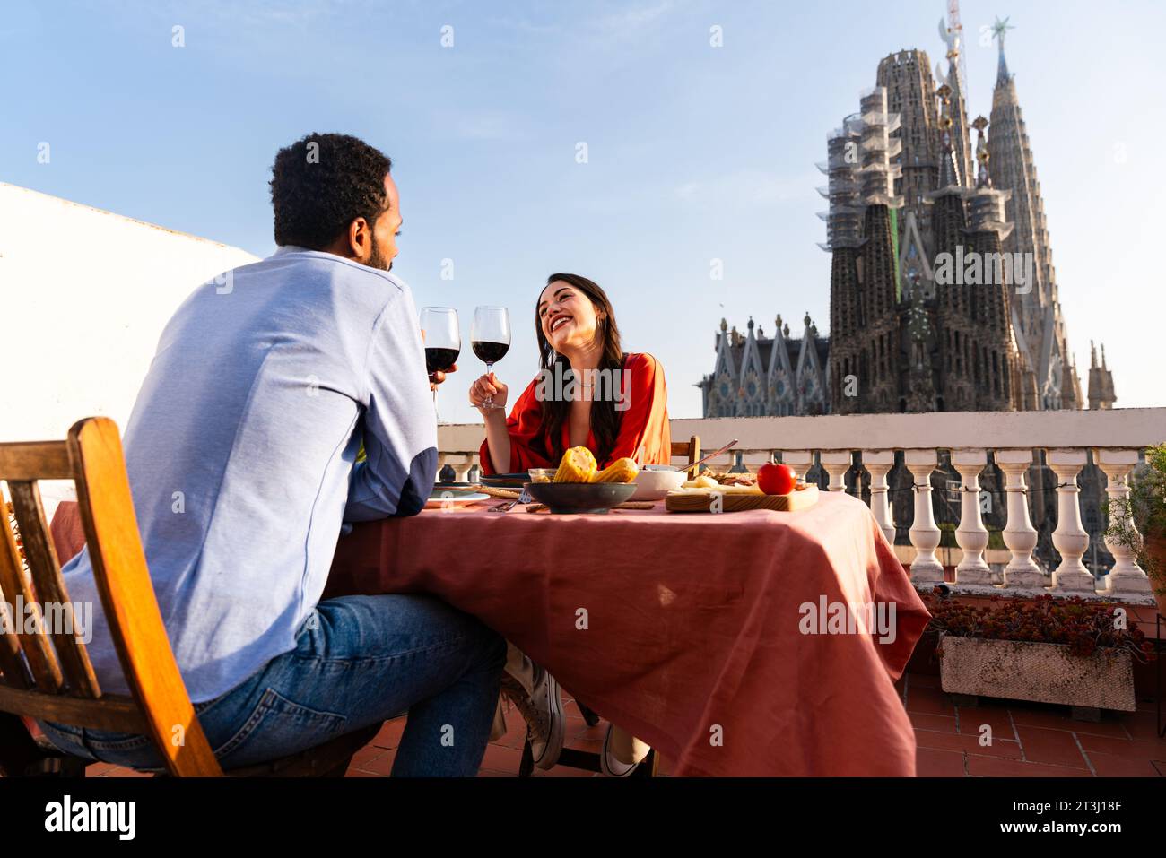 Multiracial beautiful happy couple of lovers dating on rooftop balcony ...