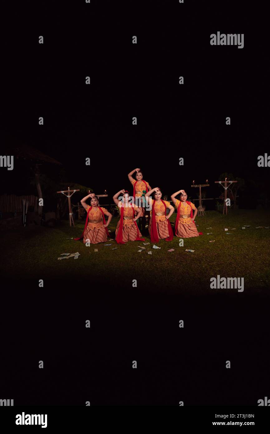 Asian dancers take pose with dance movements while performing the ...