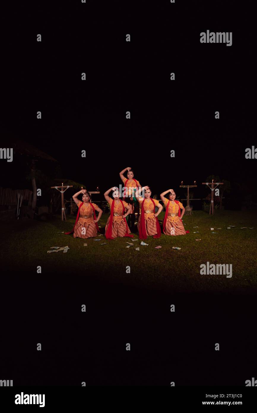 Asian dancers take pose with dance movements while performing the ...