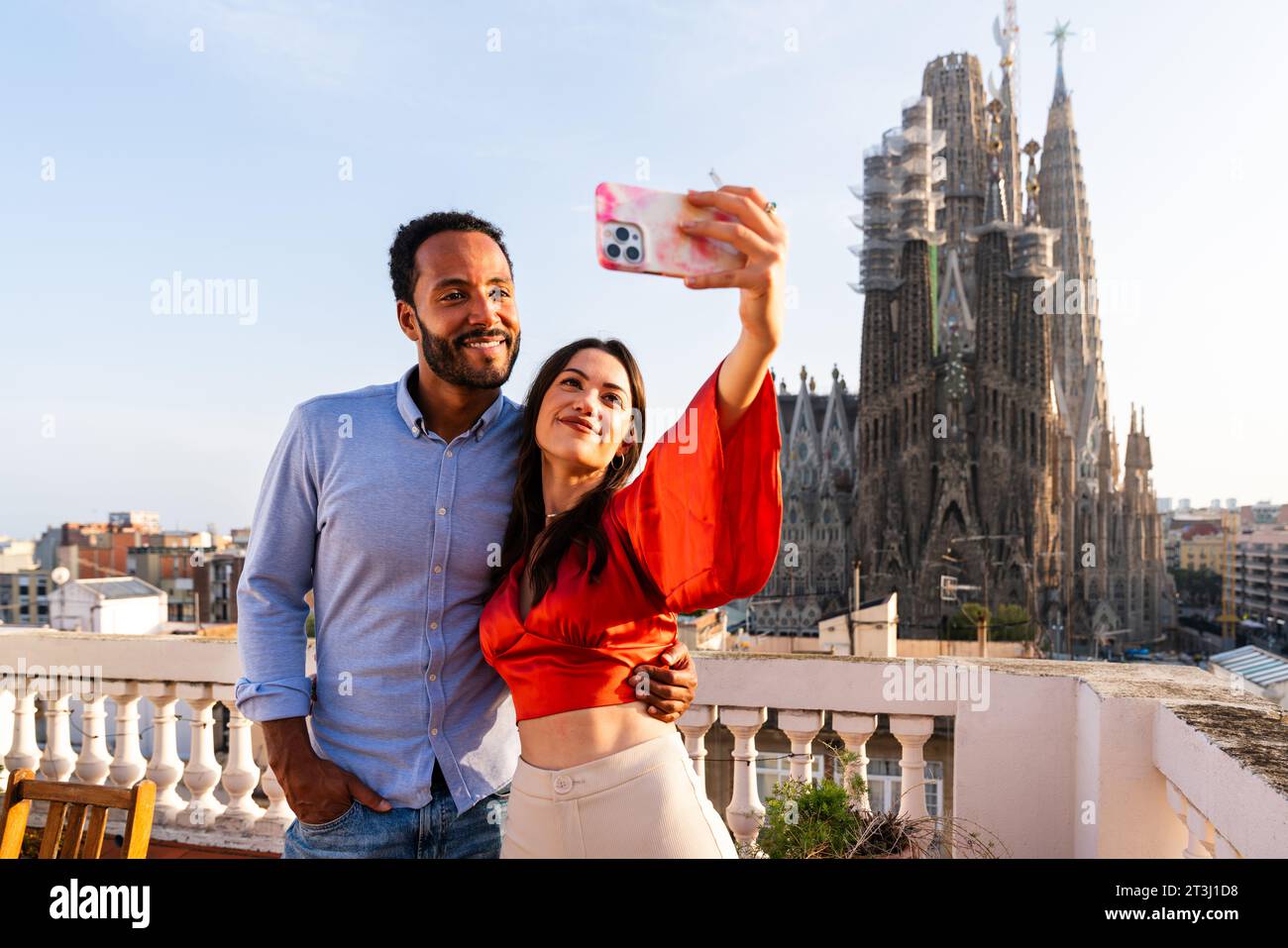 Multiracial beautiful happy couple of lovers dating on rooftop balcony ...