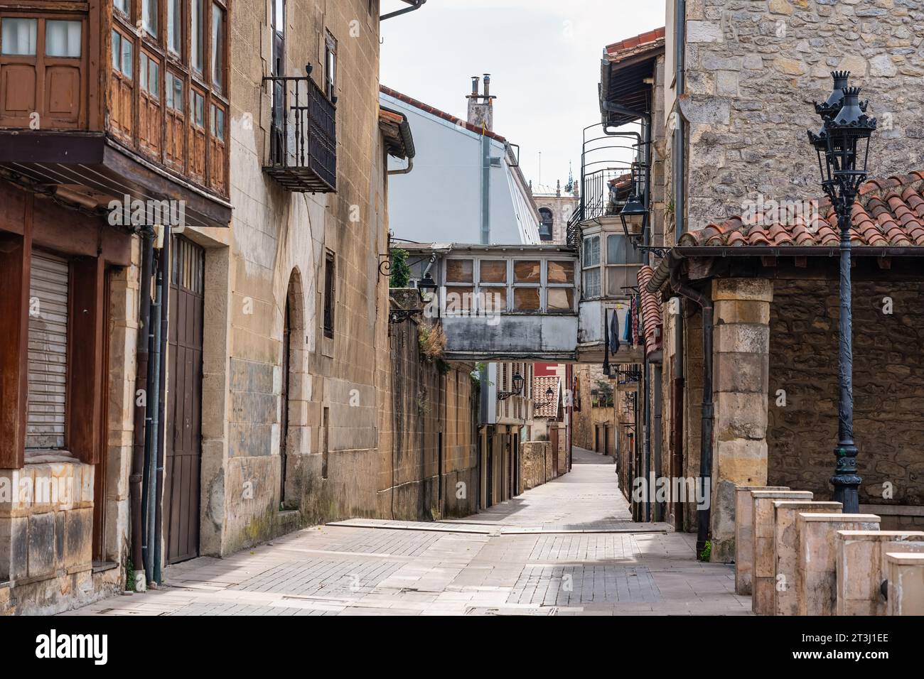 Picturesque alley with old stone houses in the medieval village of ...