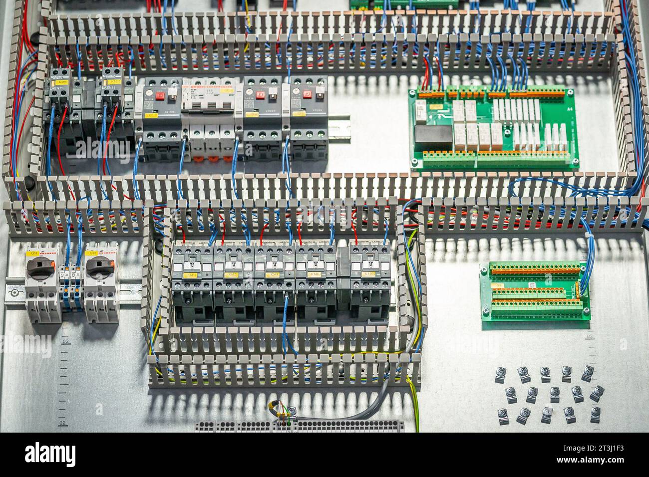 Electrical switchboard with different colored wires, switches and ...