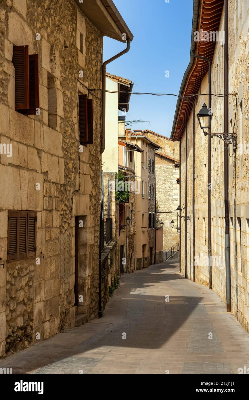 Picturesque alley with old stone houses in the medieval village of ...