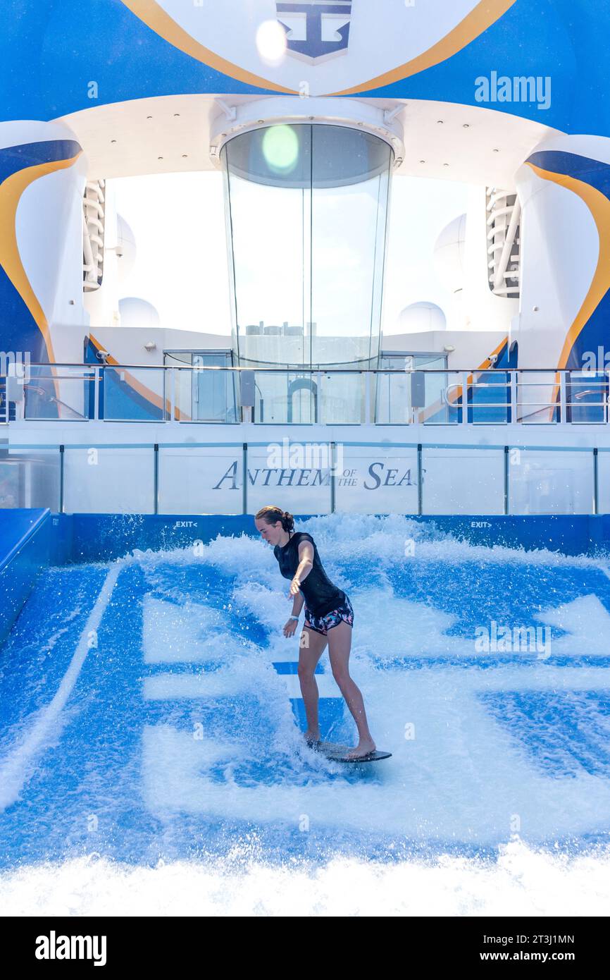 Wave board boarding young female rides on board facility facilit hi-res ...