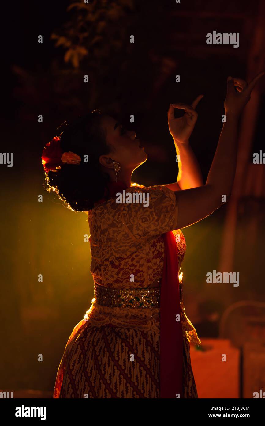 Balinese women wearing cultural clothes while posing in front of the ...