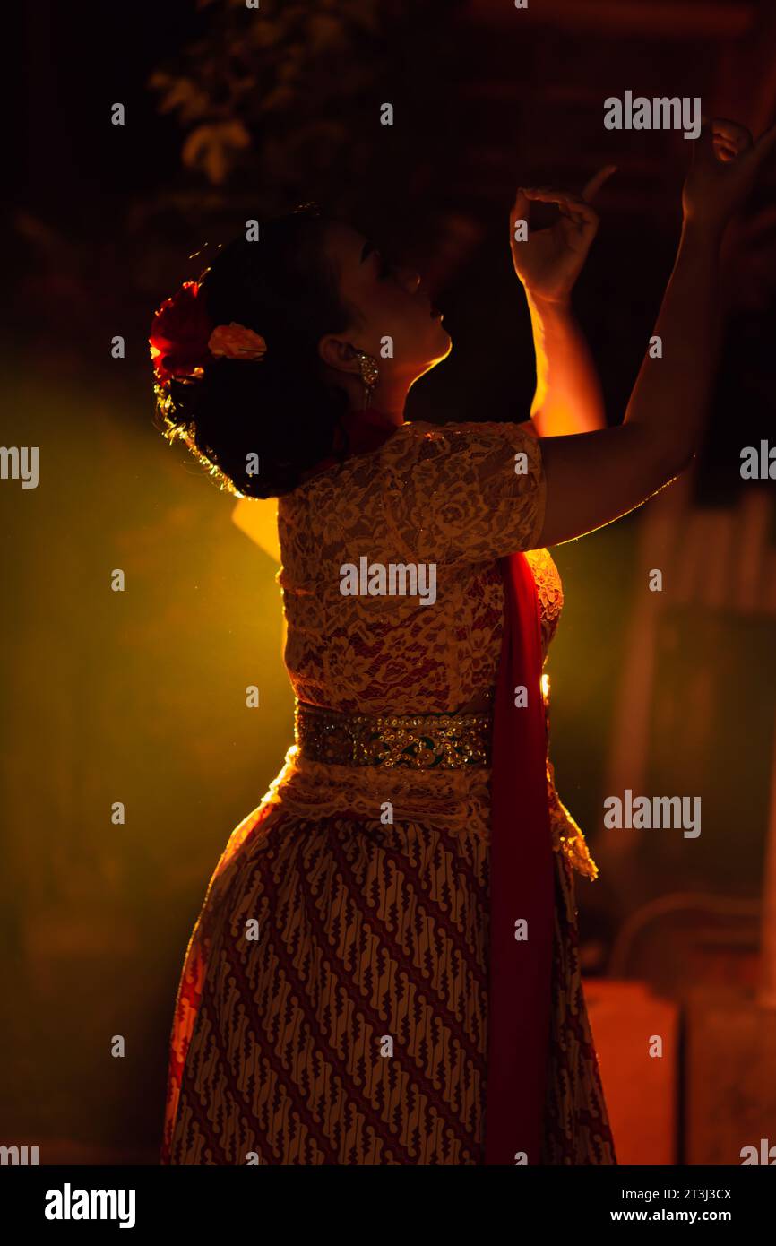 Balinese women wearing cultural clothes while posing in front of the ...