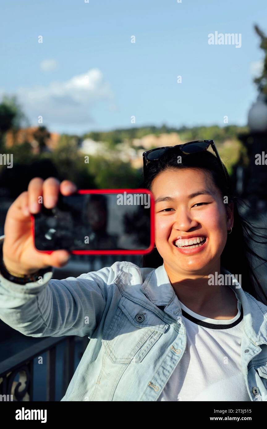 Positive asian female traveler hi-res stock photography and images - Alamy