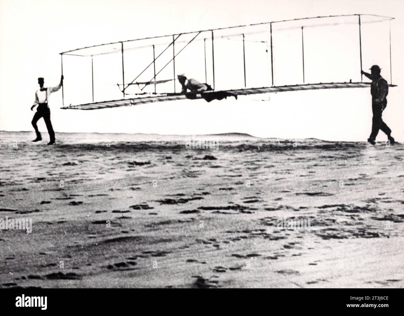 Wright brothers' third test glider being launched at Kill Devil Hills ...