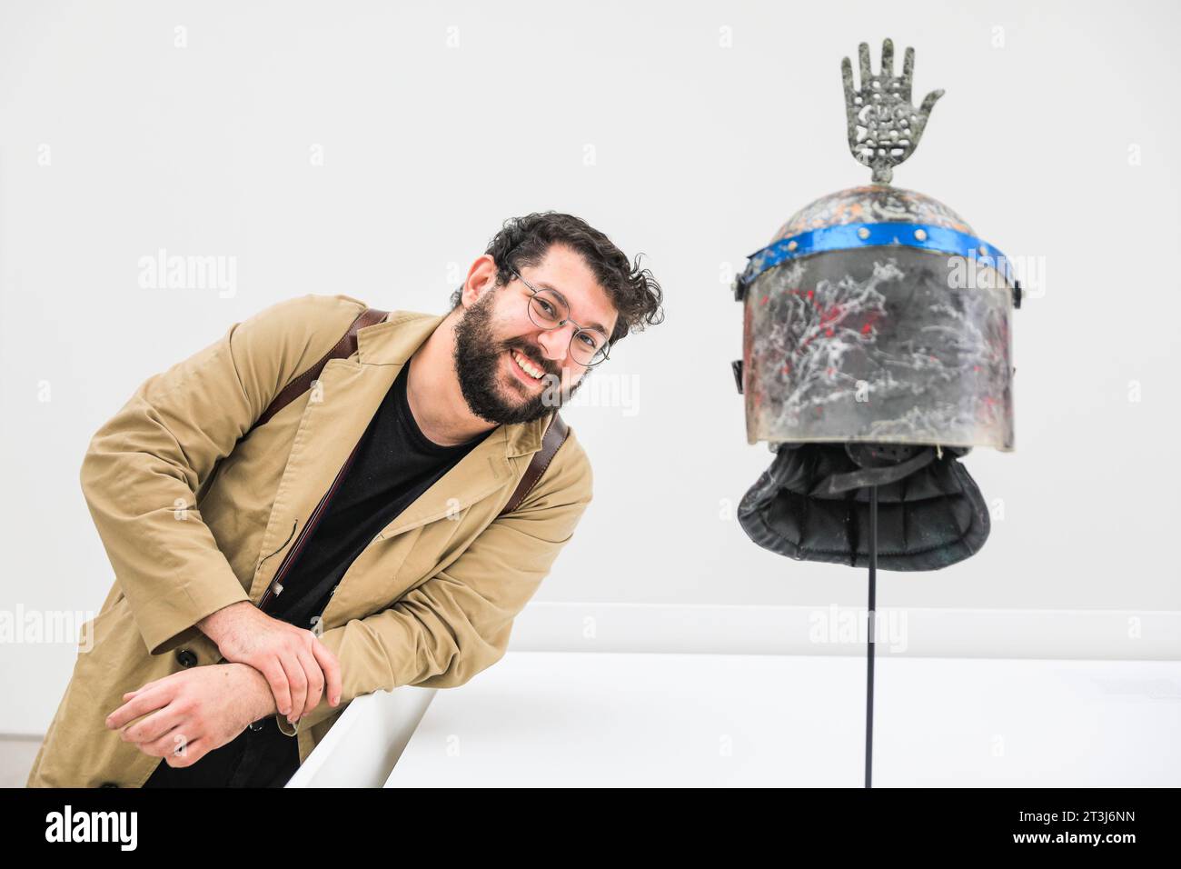 London, UK. 25th Oct, 2023. Artist Parham Ghalamdar with the helmet he ...