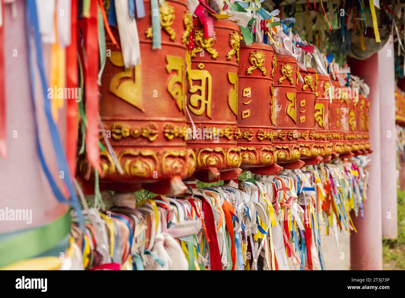 Rotating religious elements for touching turning spinning Buddhist ...
