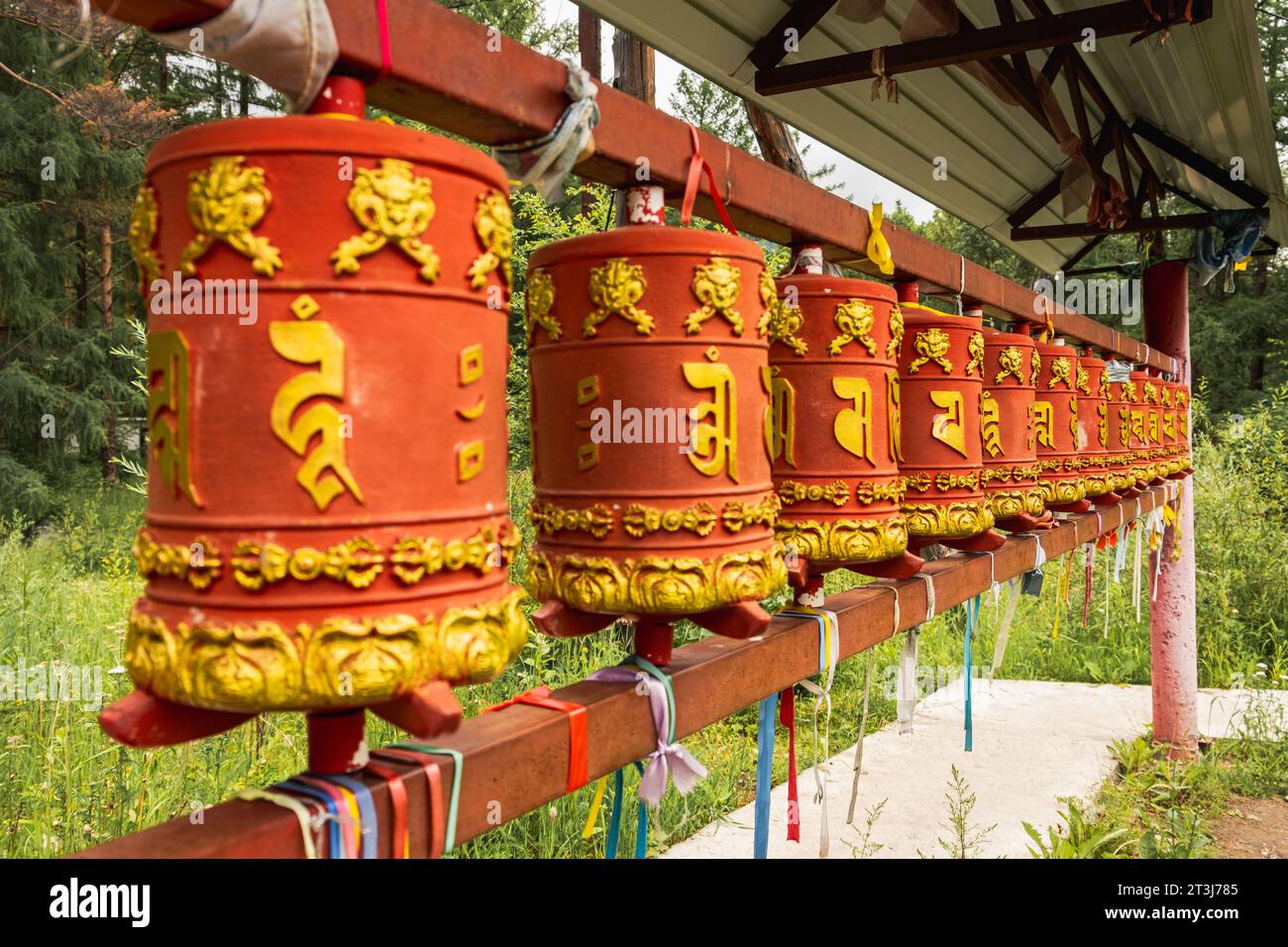 Rotating religious elements for touching turning spinning Buddhist ...