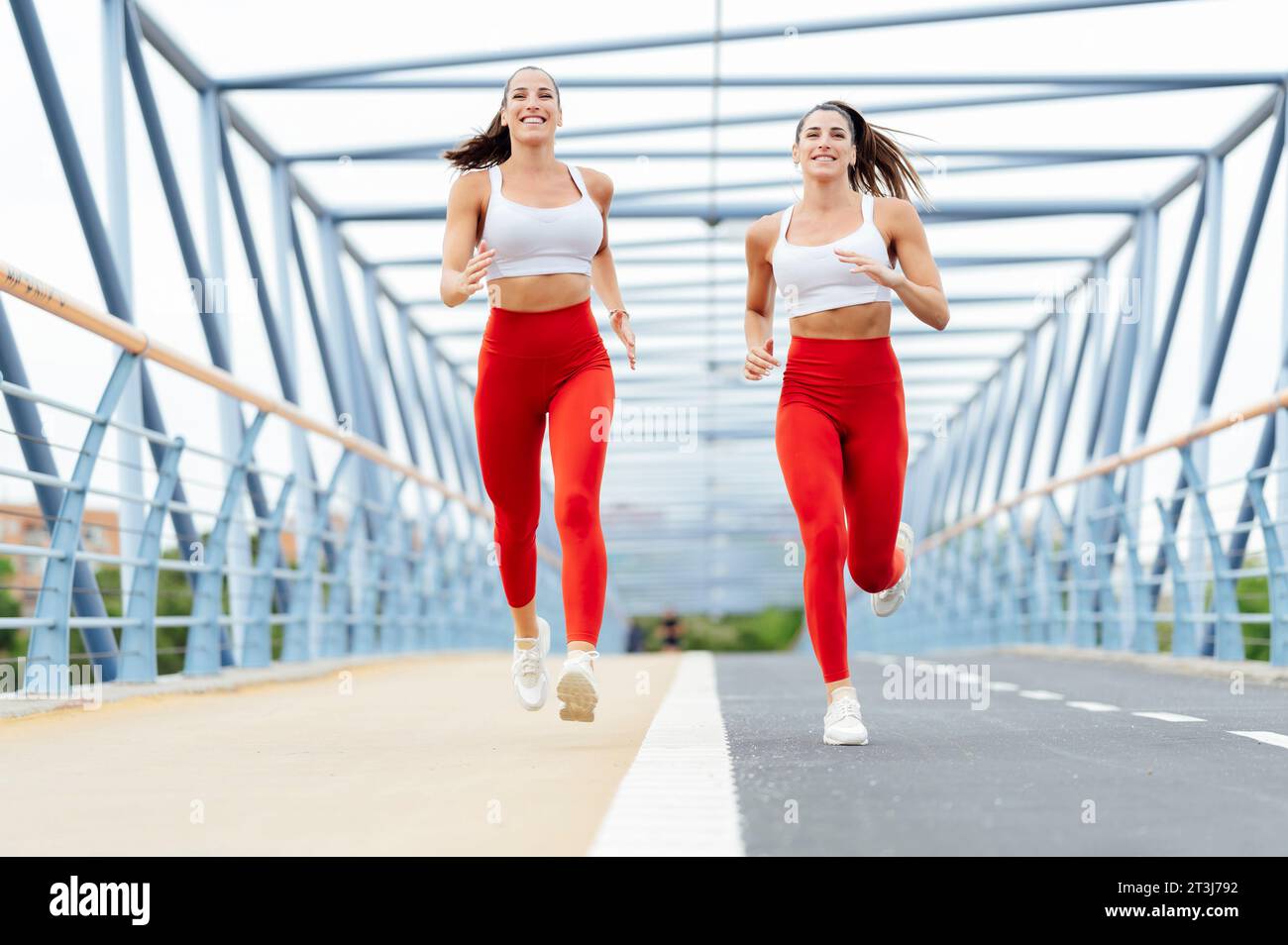 Young fit family jogging together hi-res stock photography and images ...