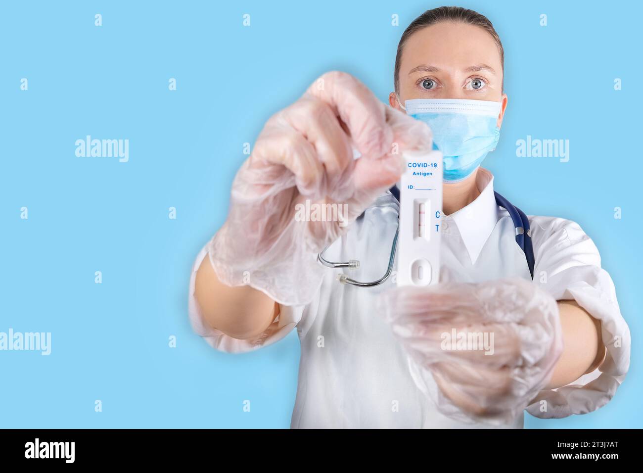 Doctor or medtech shows rapid laboratory COVID-19 test Stock Photo - Alamy