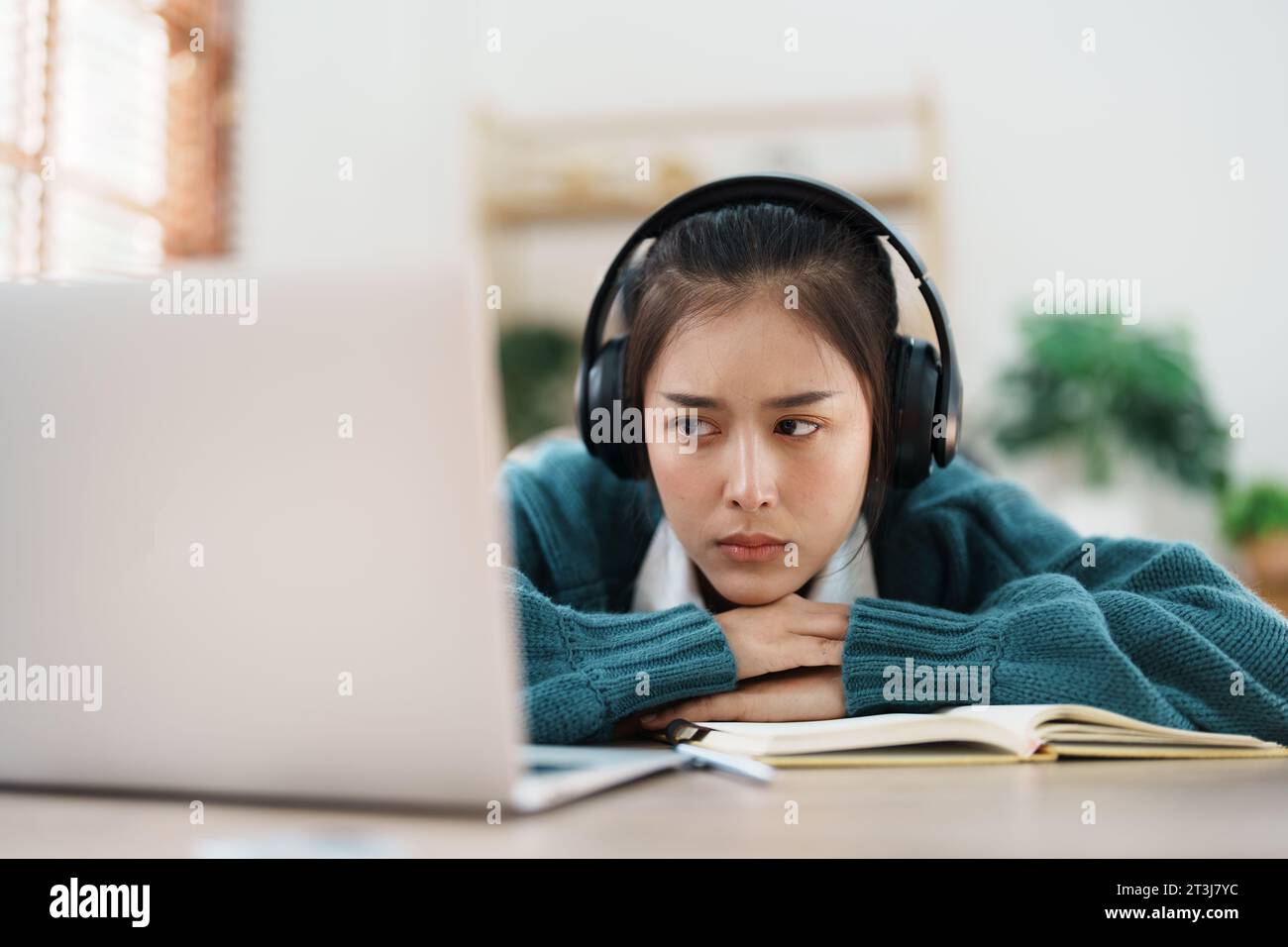 Studying online, beautiful Asian female student show symptoms burnout ...