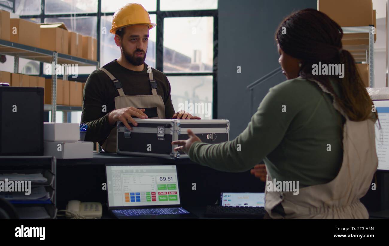 Storage center warehouse manager carrying out the logistics of ...