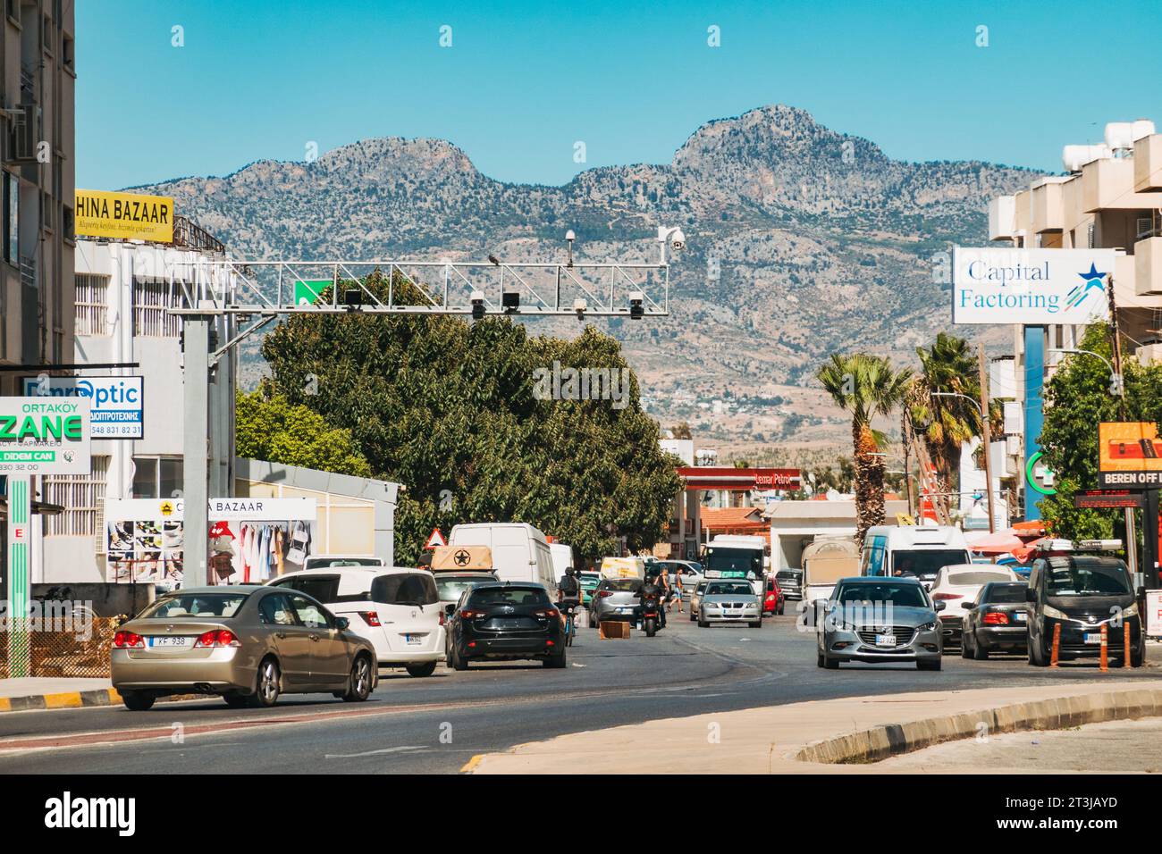 Cameras record the license plates of every passing vehicle on a road in ...