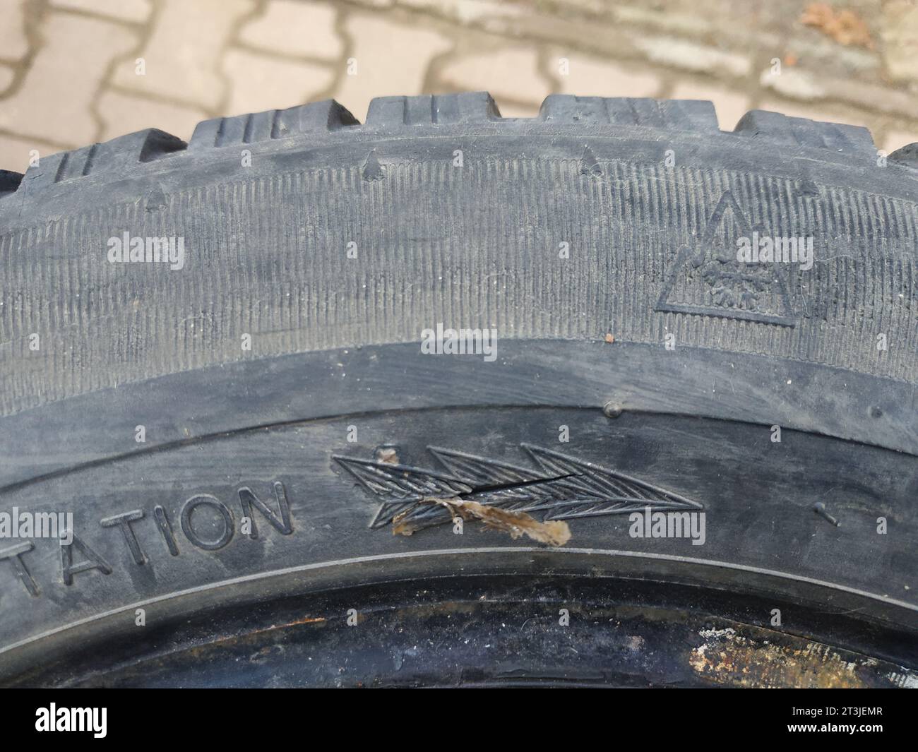 Old worn car tires. Damaged rubber. Old tyres. Recycling of rubber ...