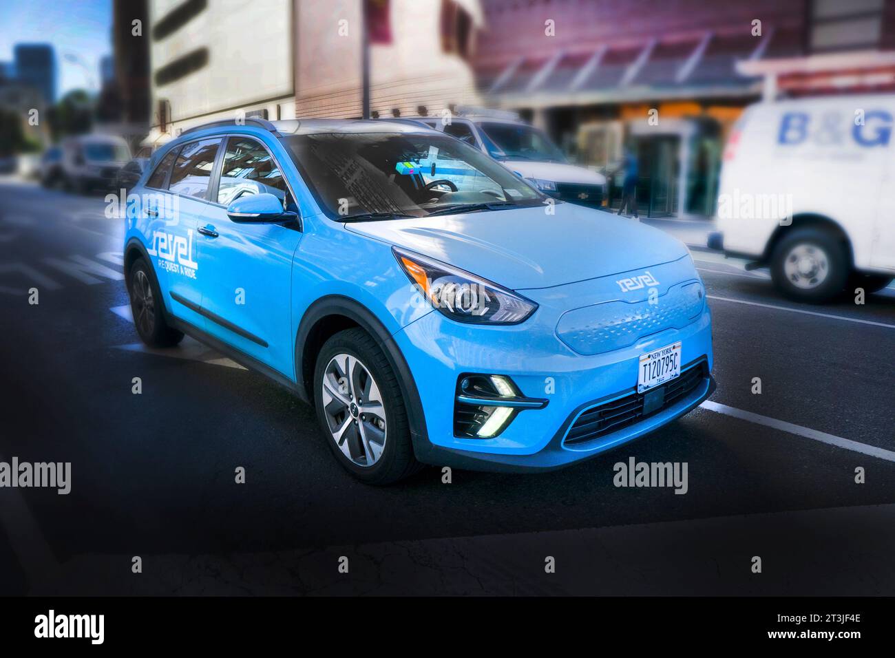 Revel electric car taxi service, blue Tesla car, Manhattan, New York ...