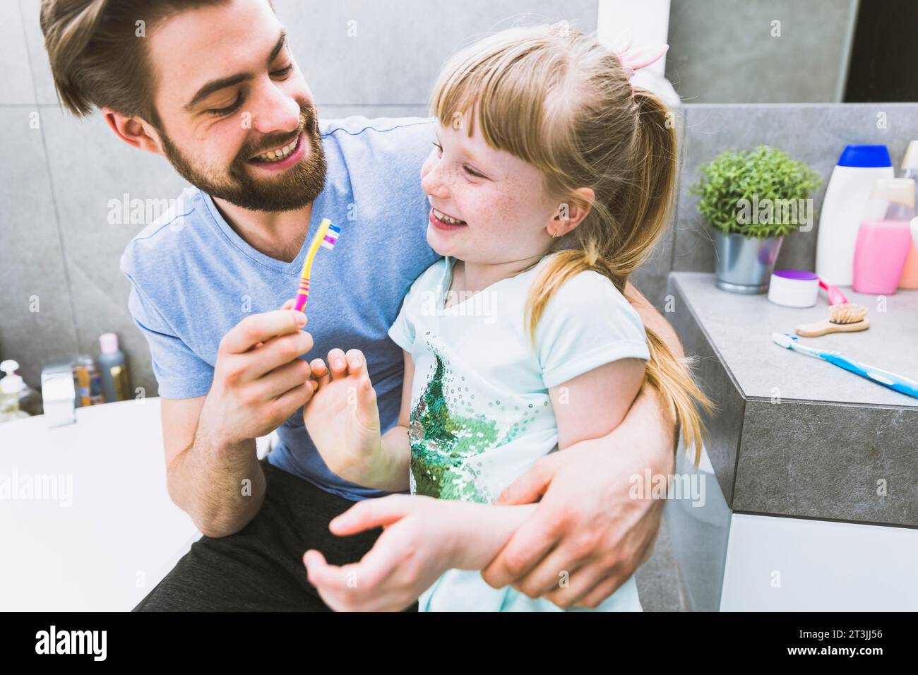 Cheerful male person cleaning hi-res stock photography and images - Alamy