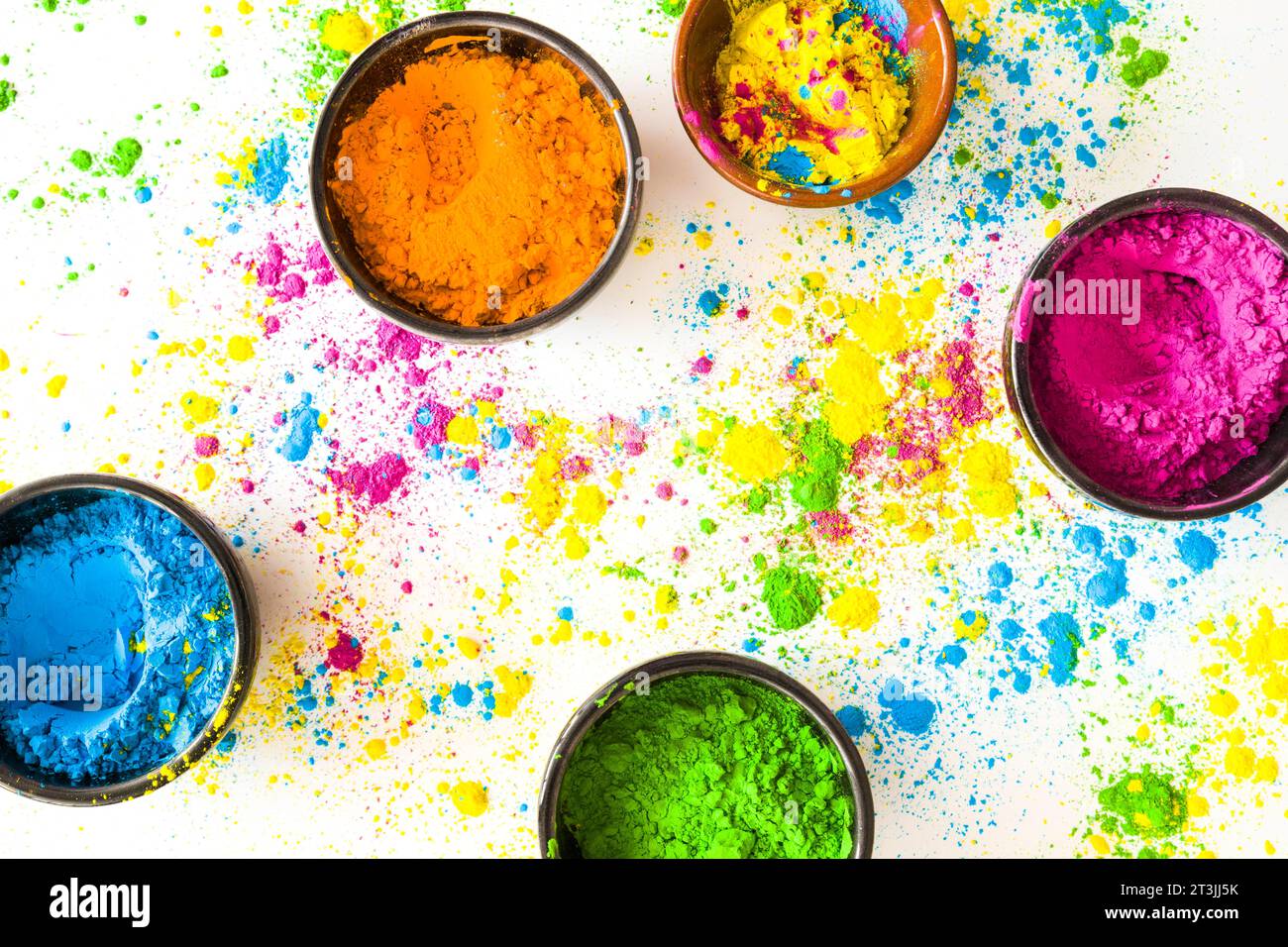 Bowl holi colored powder white background Stock Photo - Alamy