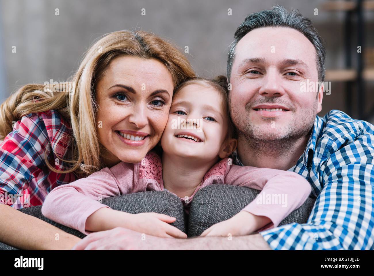 Family looking camera hi-res stock photography and images - Alamy