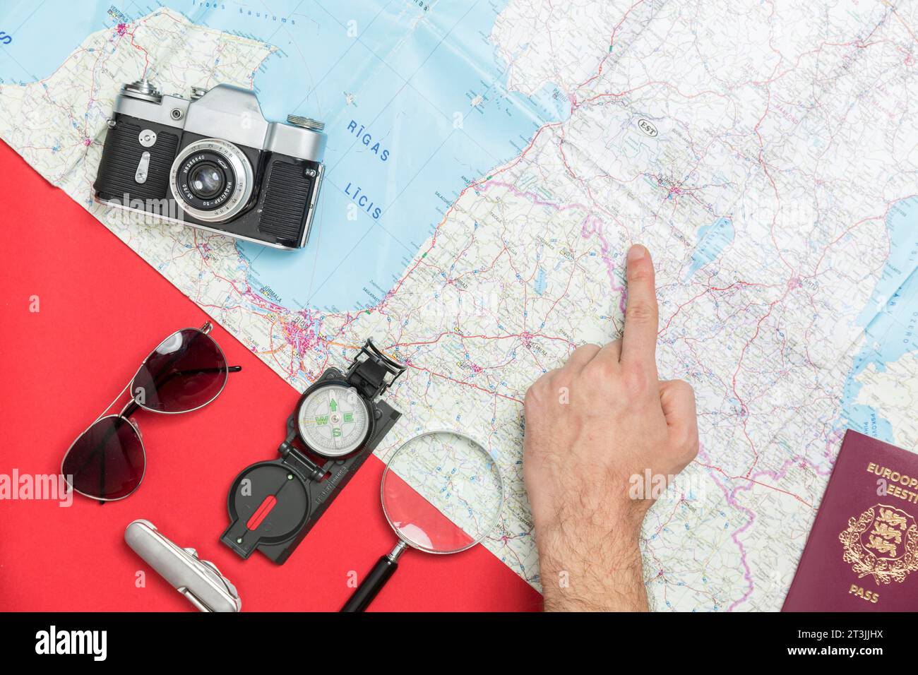 Crop hand choosing place map Stock Photo - Alamy