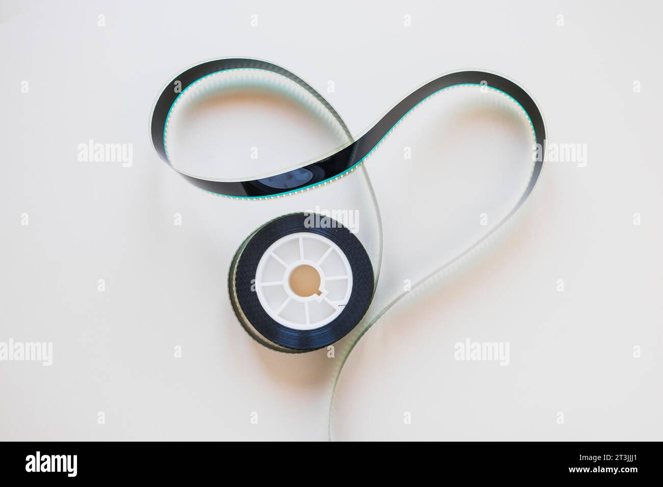 Curvy film reel white Stock Photo - Alamy