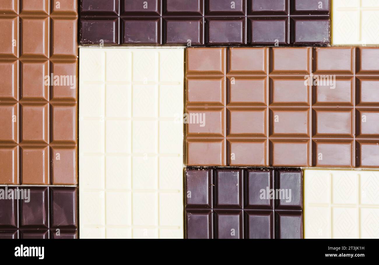 Flat lay assortment with different chocolate types Stock Photo - Alamy