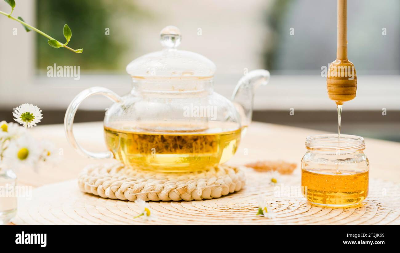 Front view dipper honey jar teapot Stock Photo - Alamy