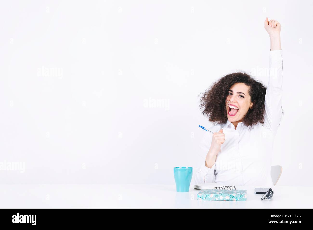 Funny woman celebrating victory Stock Photo - Alamy