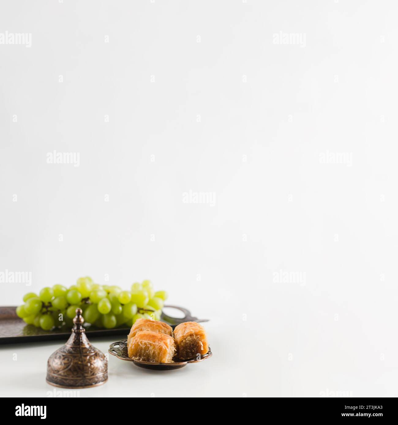 Green grape tray near baklava Stock Photo - Alamy