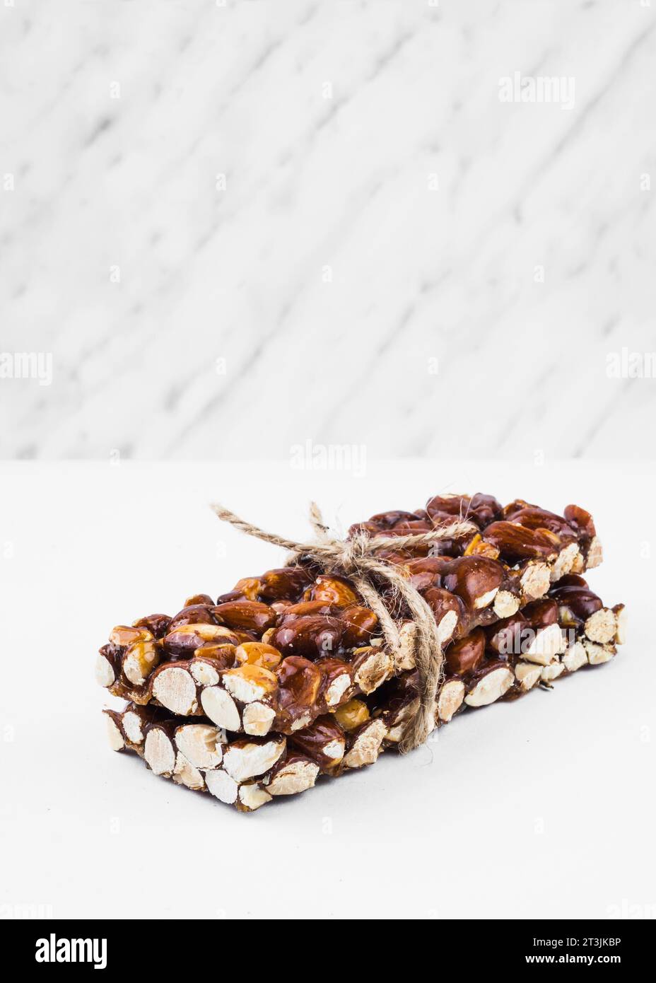 Healthy dried fruits tied with string white background Stock Photo - Alamy
