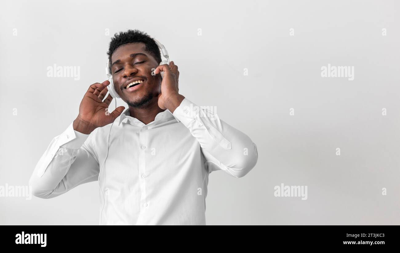 Happy man listening music Stock Photo - Alamy