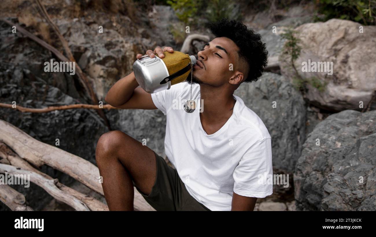 High angle man drinking water Stock Photo - Alamy