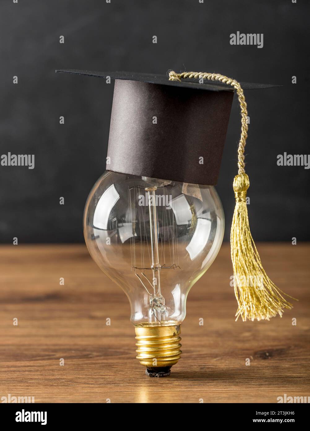 Light bulb with graduation cap Stock Photo - Alamy