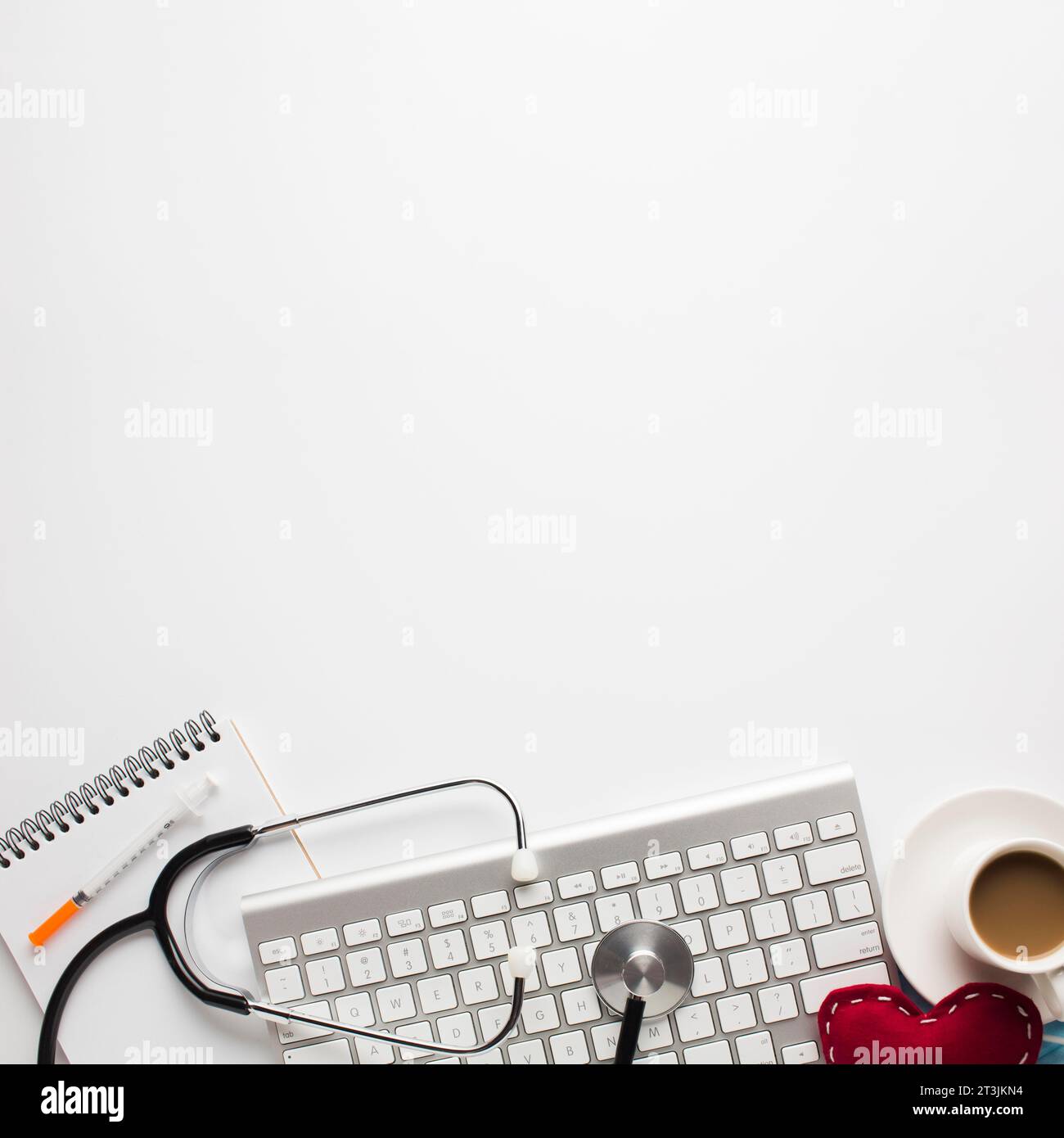 Medical tool cup coffee with stitched toy heart isolated white ...