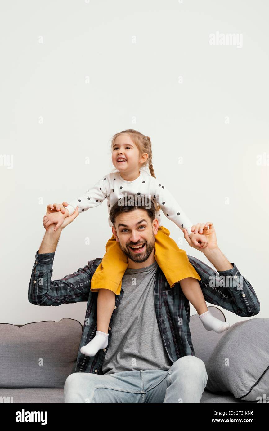 Medium shot happy father kid Stock Photo - Alamy