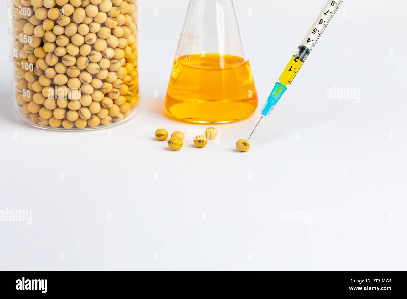 Soybeans with syringe. Genetically modified crops, herbicide and insect ... Soybeans with syringe. Genetically modified crops, herbicide and insect ...