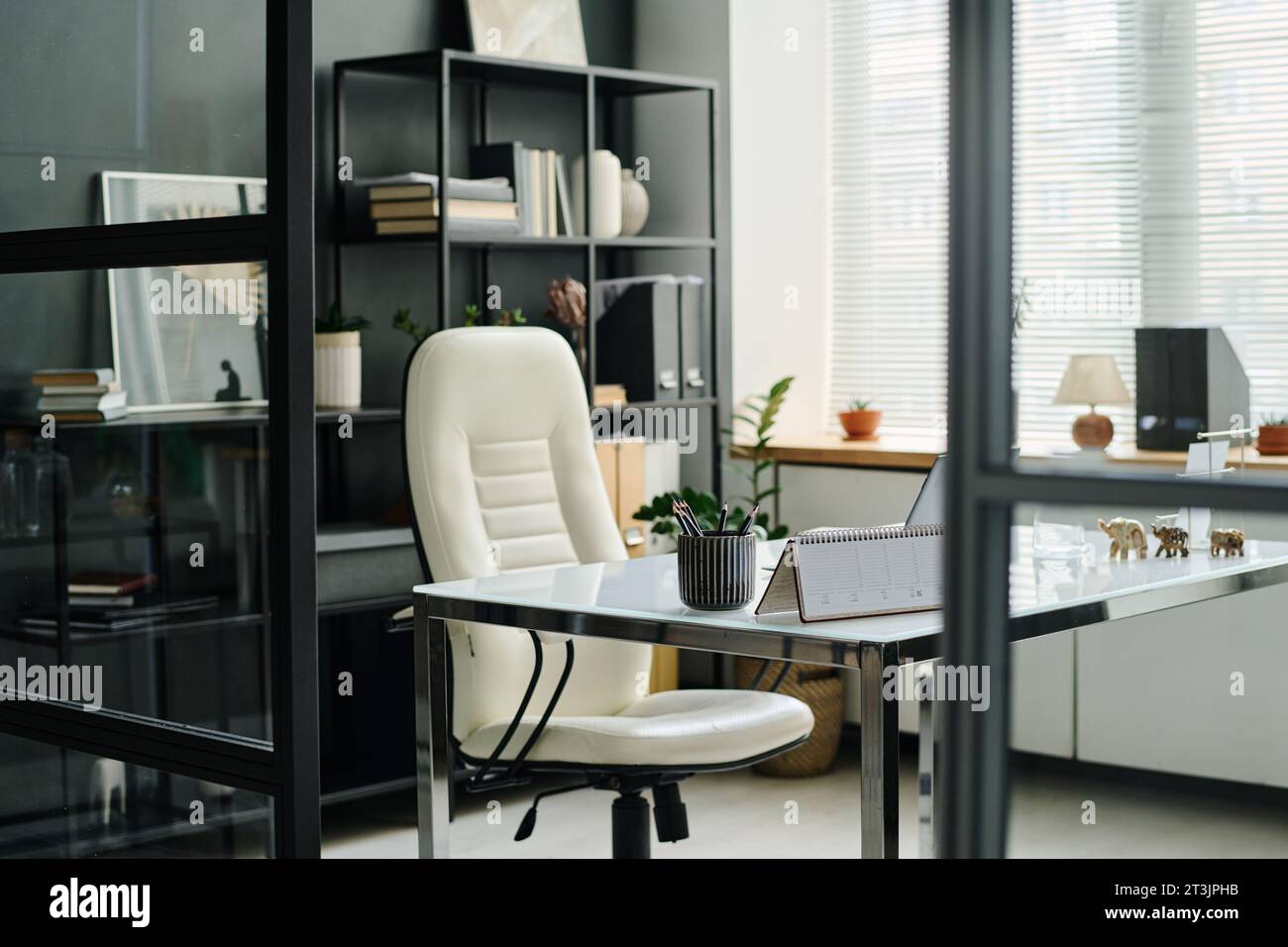 Workplace of chief executive officer with comfortable white leather ...