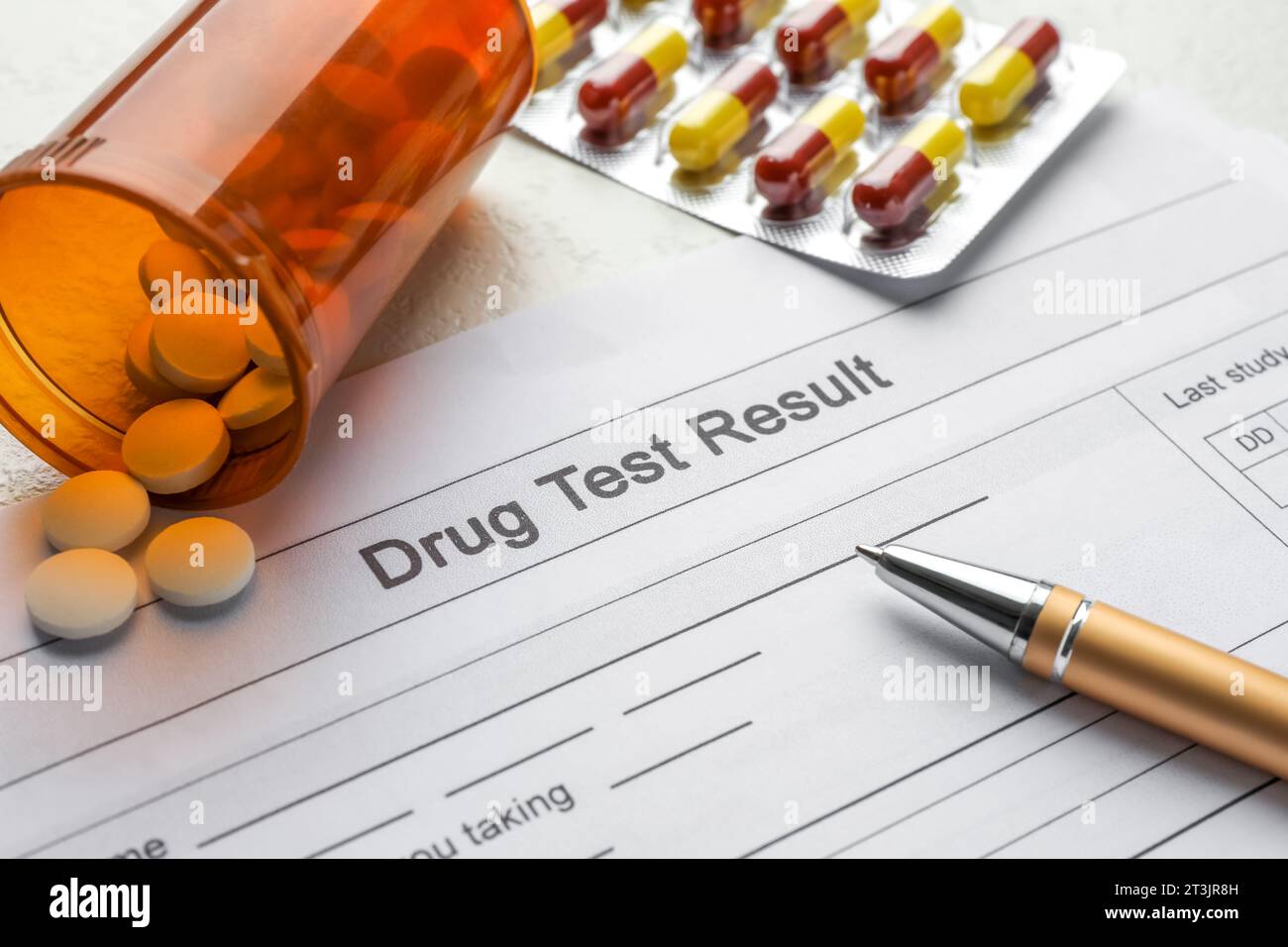 Drug test result form, pills and pen on light table, closeup Stock ...