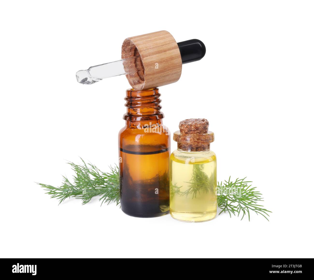 Bottles of essential oil, pipette and fresh dill isolated on white ...