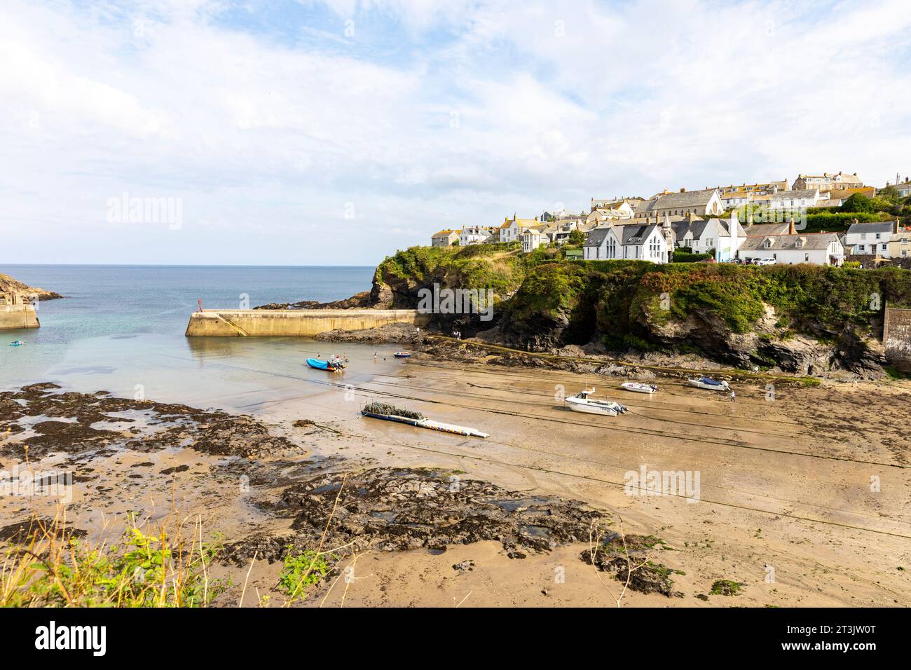 Port Isaac Cornwall harbour entrance and beach at low tide, white ...